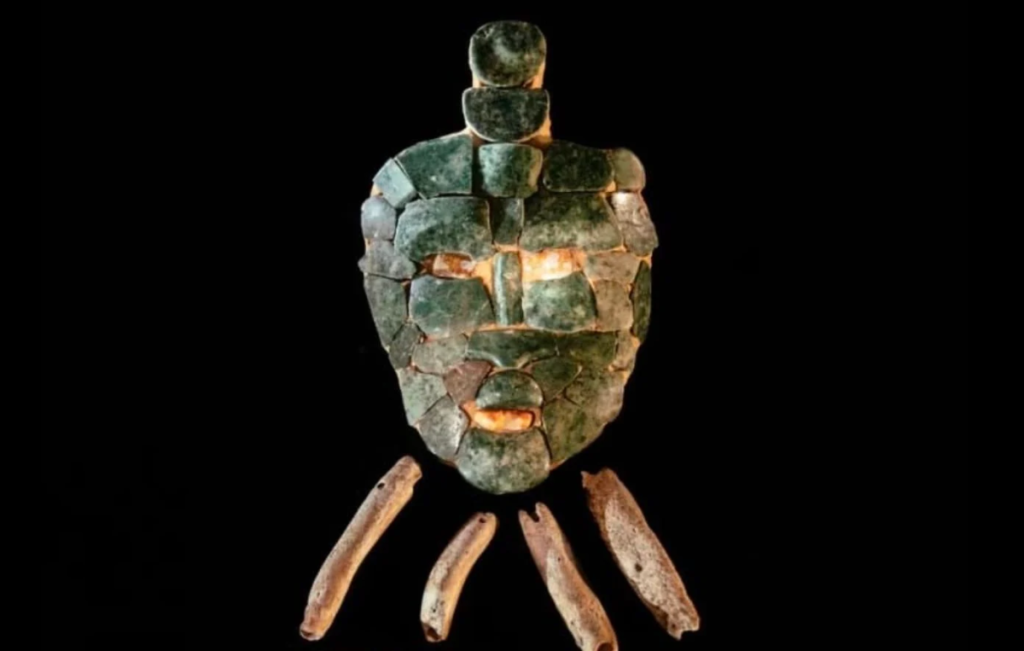 The discovery of a striking jade mask in the tomb of a Maya king in ...